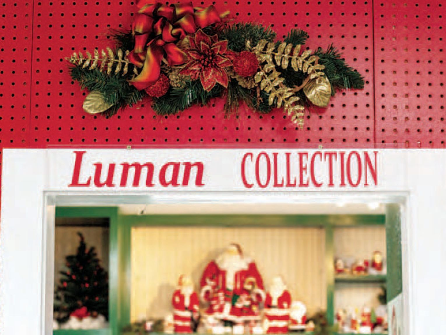 An acrylic sign marks a room as the Luman Collection