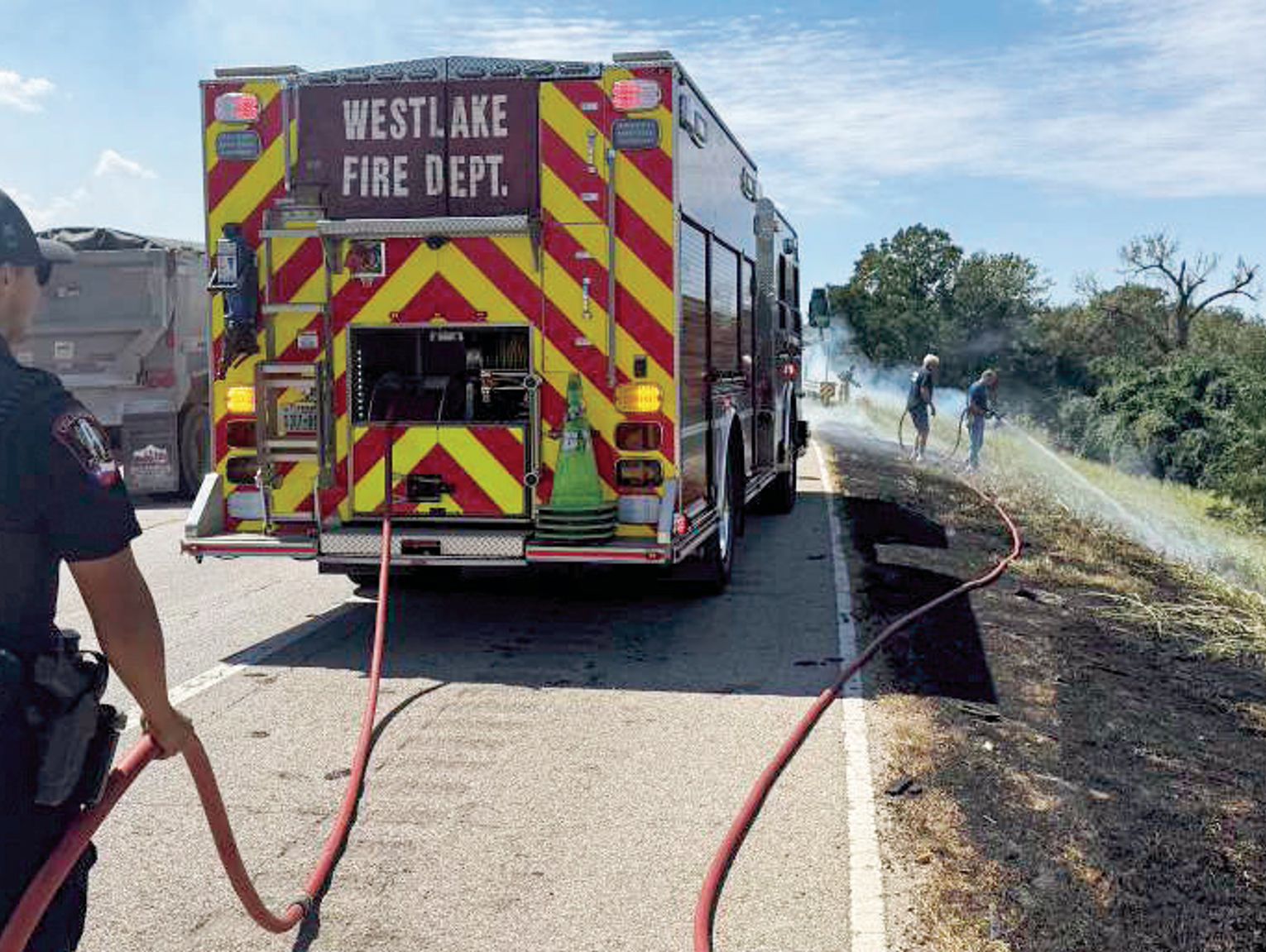 Oakridge VFD battles grass fire right after picking up new engine